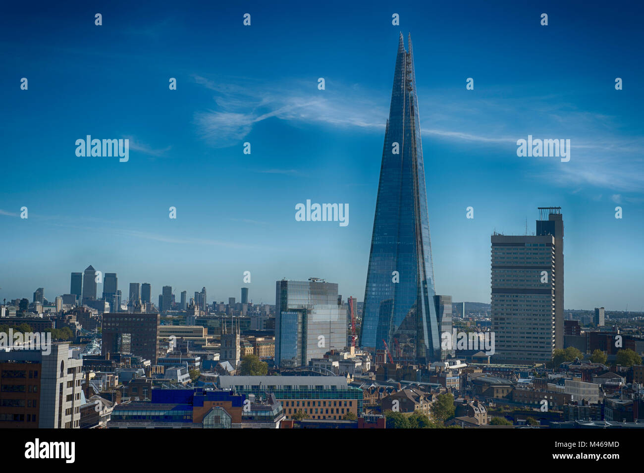 London skyline in blue sky with The Shard skyscraper building and ...