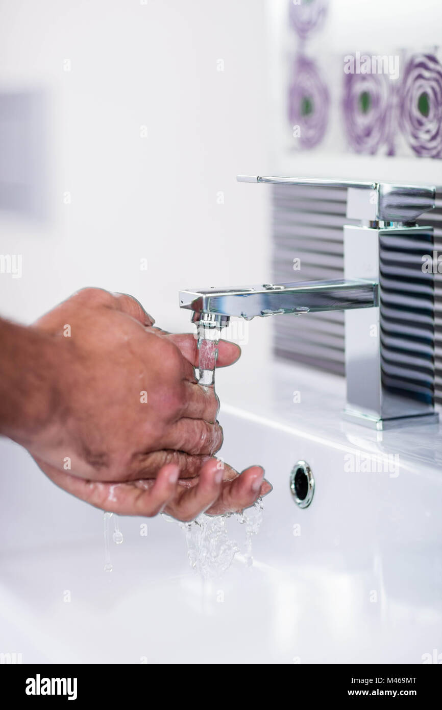 Close up of washing hands under running water Stock Photo - Alamy