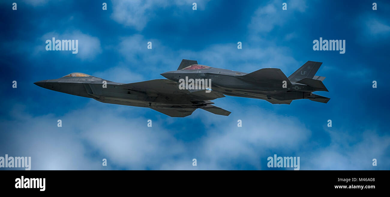 Lockheed Martin F22 Raptor and F-35 Lightning II flying side-by-side at ...