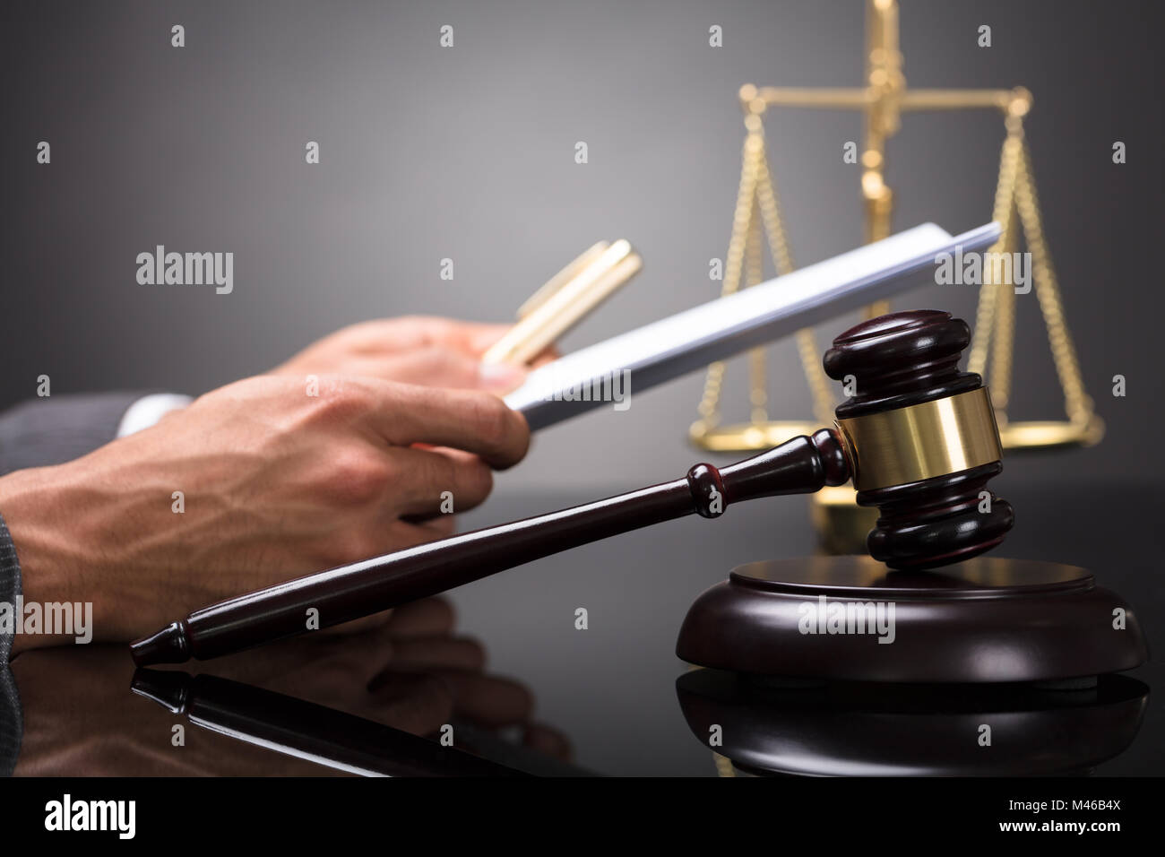 Judge holding a gavel hi-res stock photography and images - Alamy