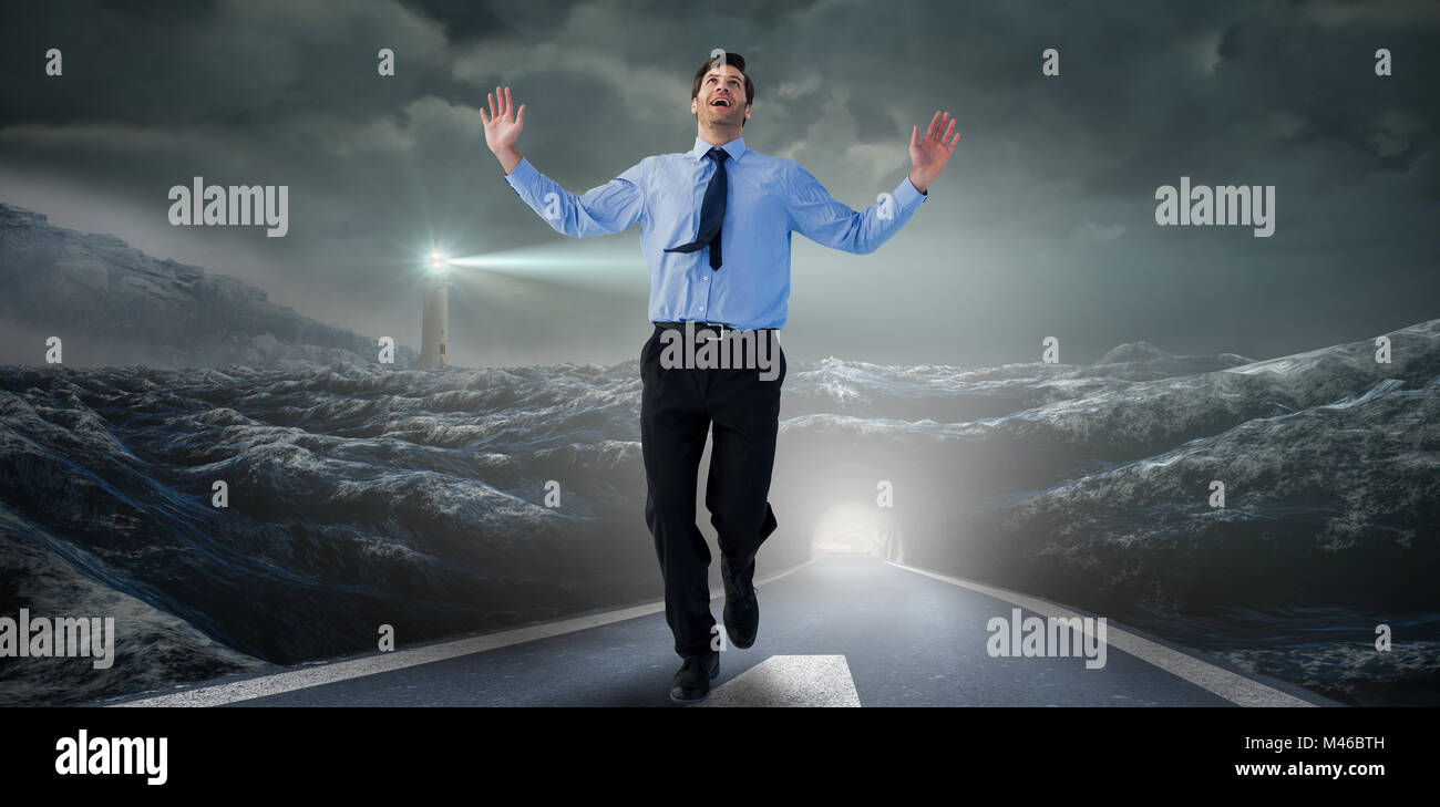 Composite image of happy businessman running with hands up Stock Photo ...