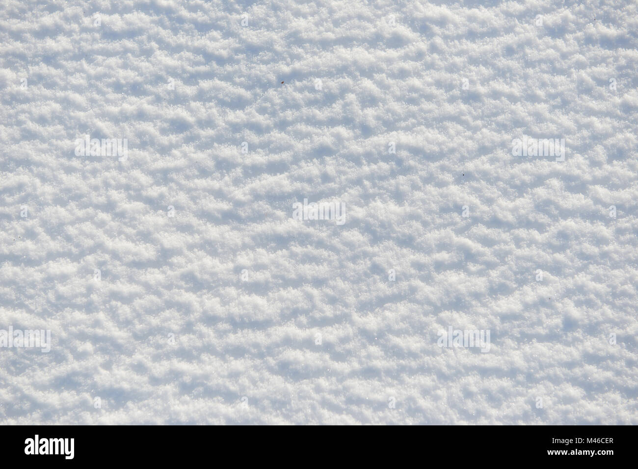 snow for texture or background at sunny day, bright light with shadows ...