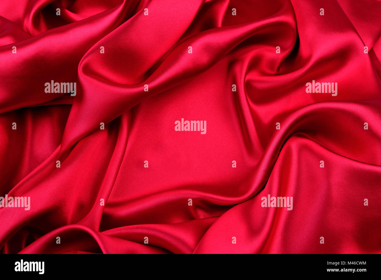 Closeup of ripples in red silk fabric Stock Photo - Alamy