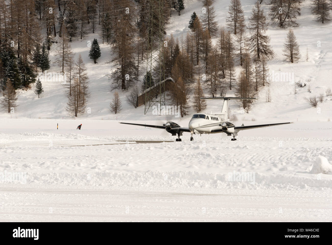 A private jet in the airport of St Moritz in the alps switzerland in ...