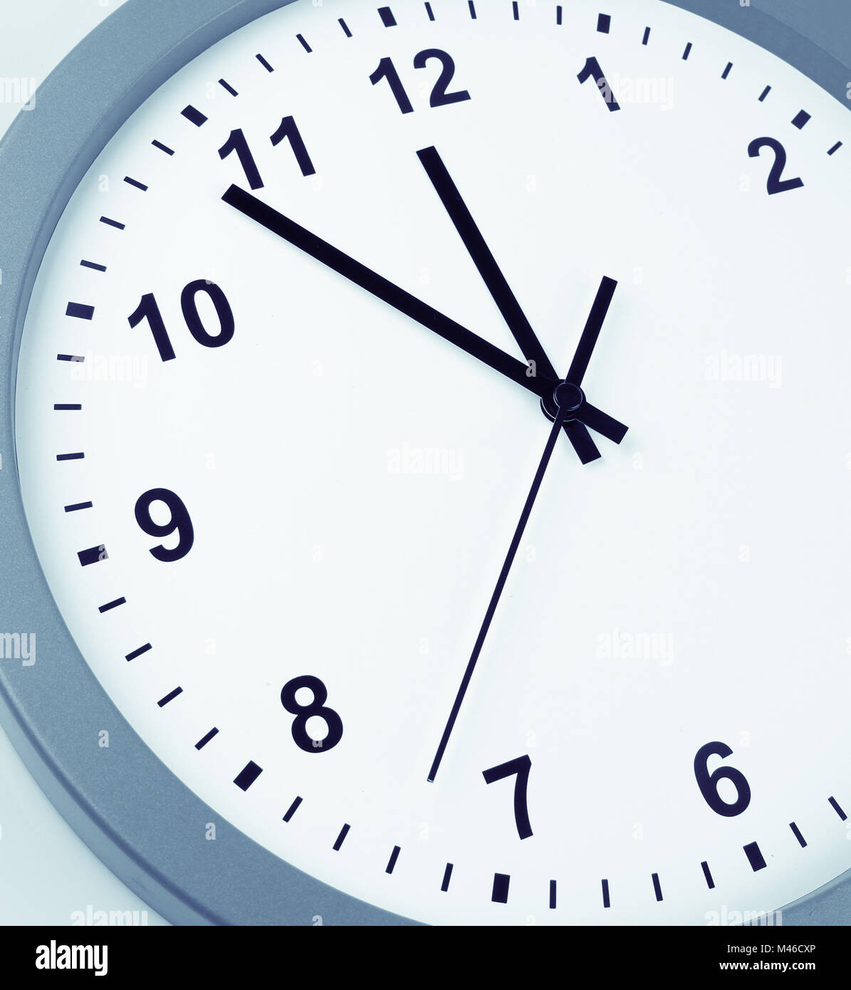 Closeup of hands on clock face Stock Photo - Alamy