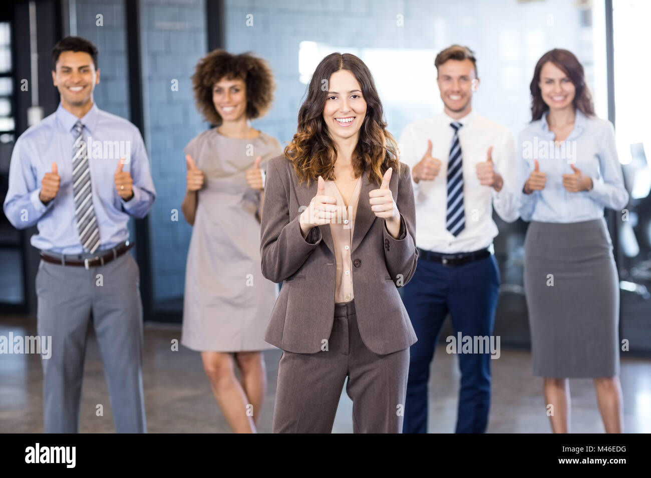 Successful business team celebrating their victory Stock Photo - Alamy