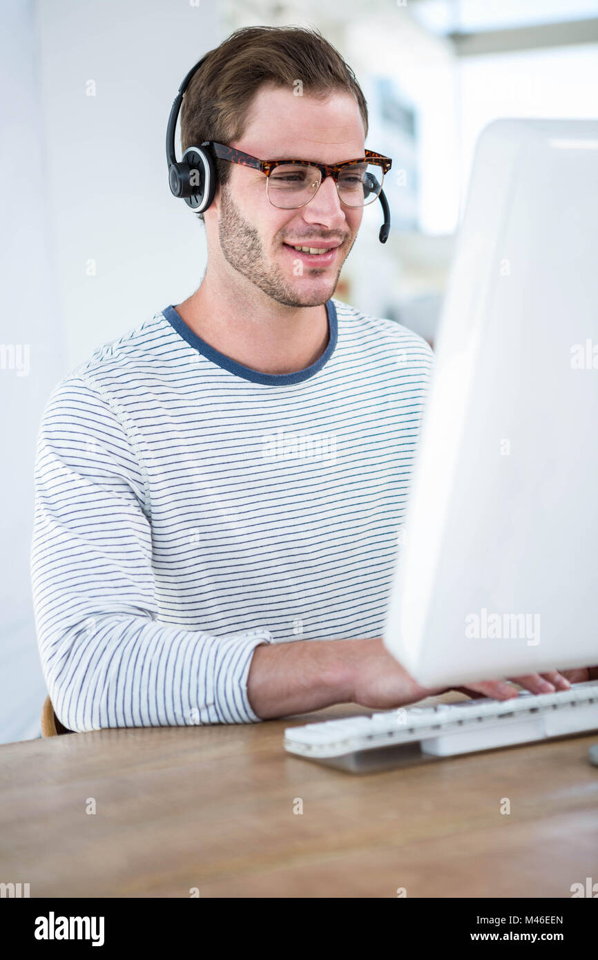 Man sitting on chair headset hi-res stock photography and images - Alamy