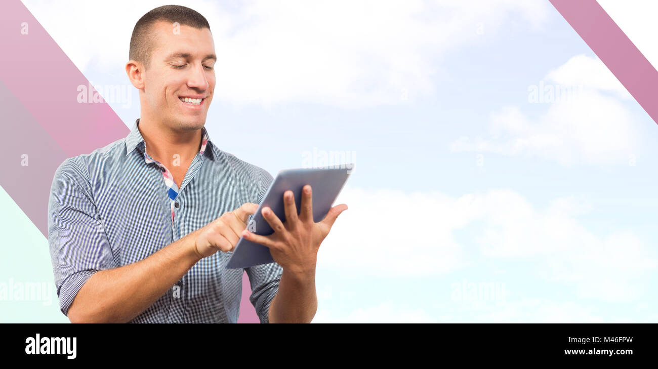Composite image of businessman using digital tablet over white ...