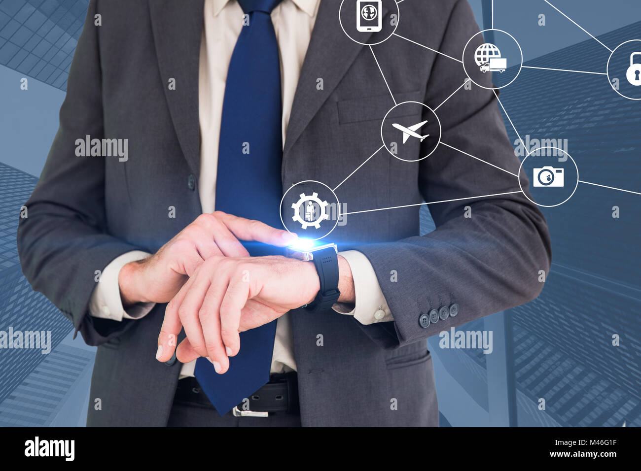 Composite image of businessman looking at watch Stock Photo - Alamy