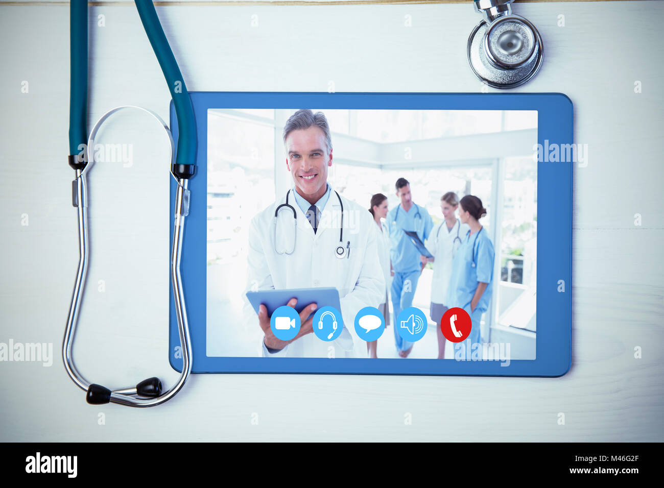 Composite image of smiling doctor holding digital tablet Stock Photo ...