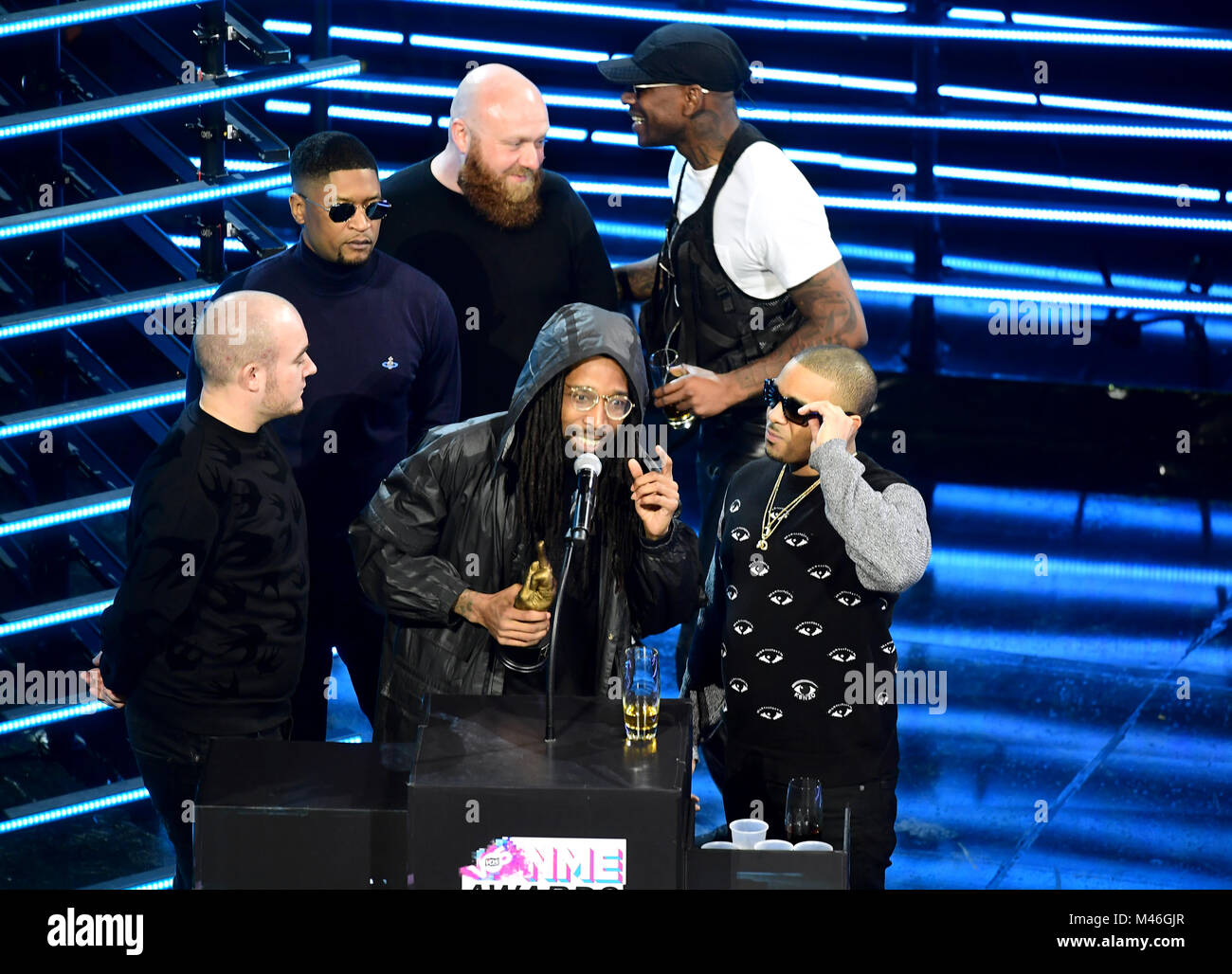 Boy Better Know collecting the NME Innovation award presented by Annie ...