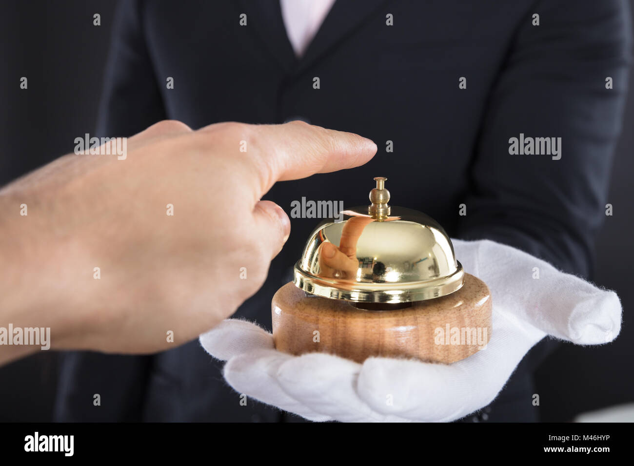 Service bell hotel hand hi-res stock photography and images - Alamy