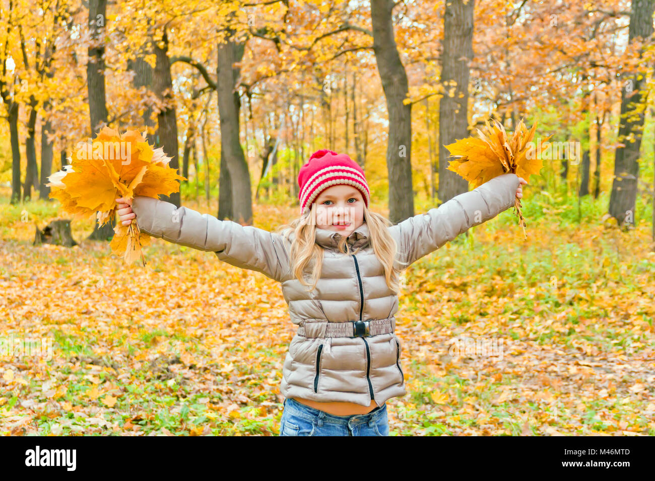 Photo of cute dancing girl in autumn Stock Photo - Alamy