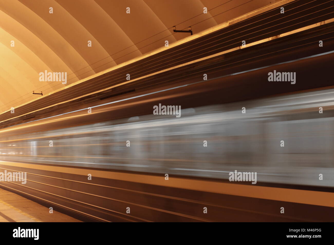 Subway platform with moving fast train Stock Photo - Alamy