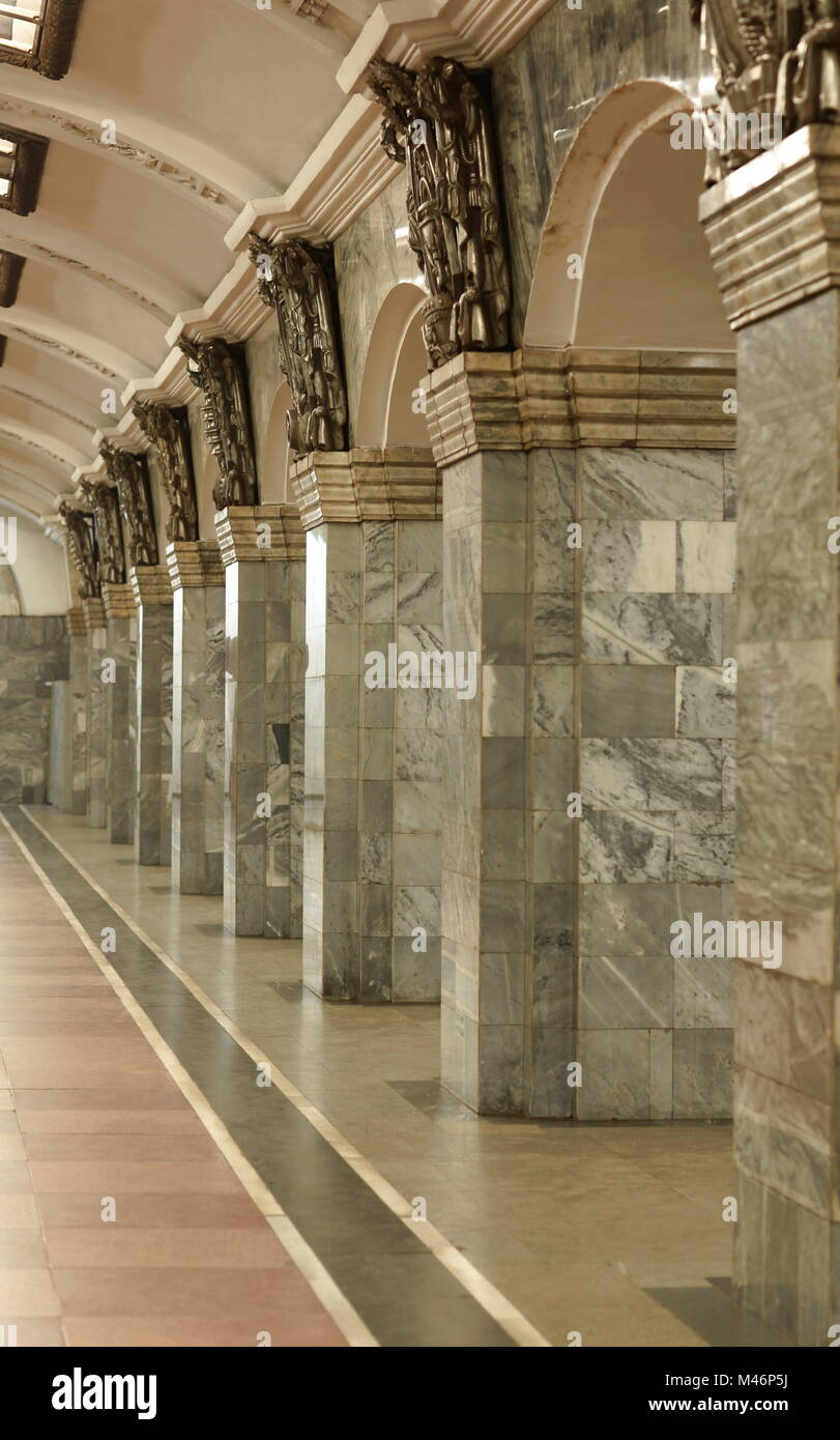 Fragment of the interior with columns lined with gray granite and metal ...