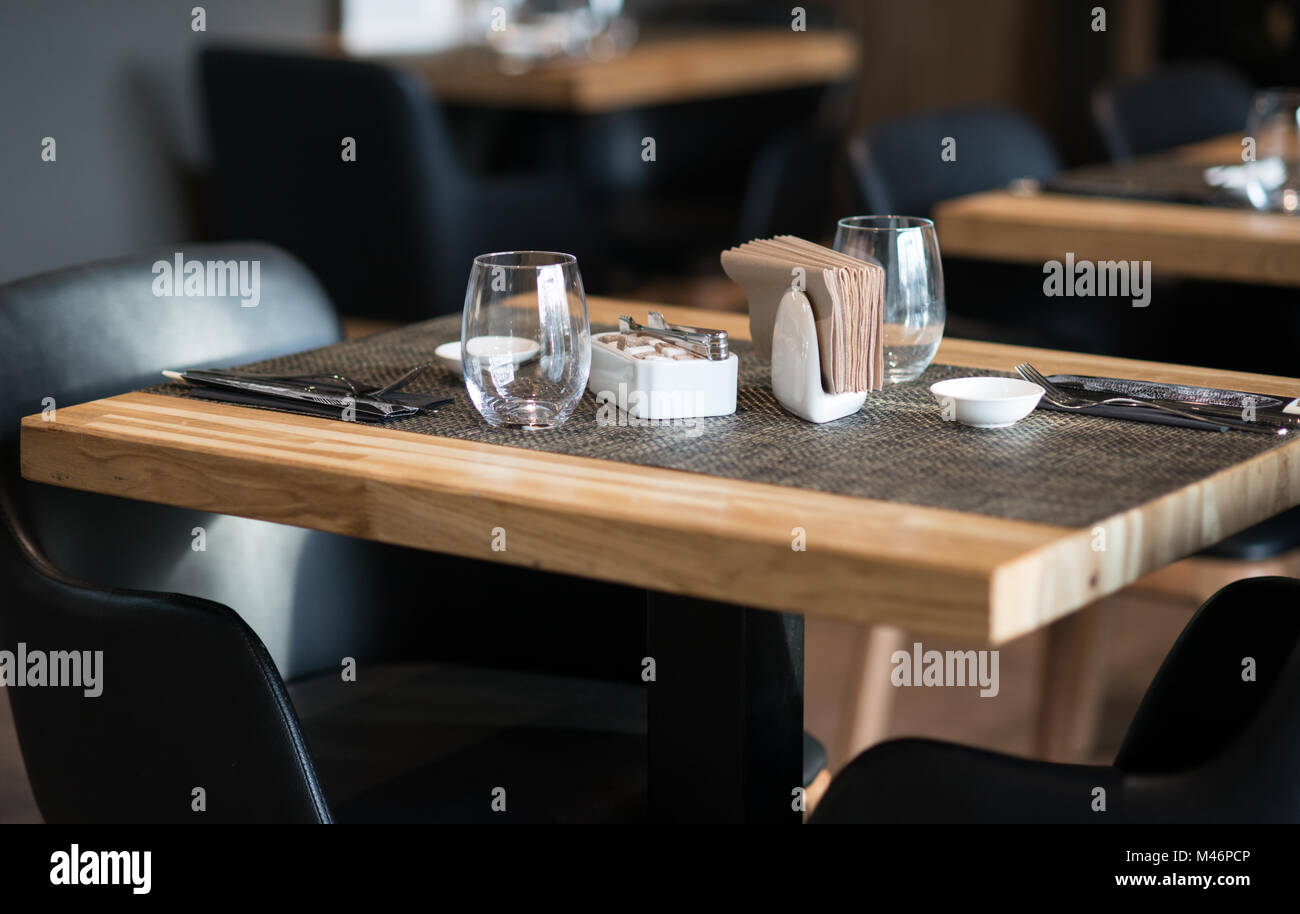 Table setting, interior elements and silverware in japaneese restaurant ...