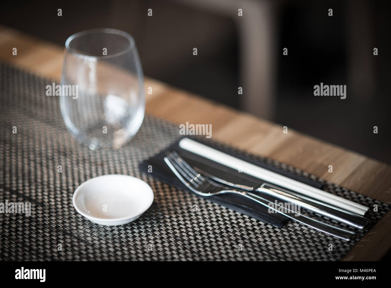 Table setting, interior elements and silverware in japaneese restaurant ...