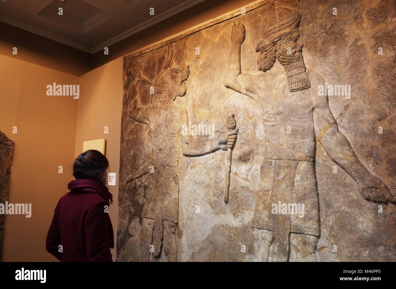 Assyrian wall art relief at the British Museum, London, England, UK ...