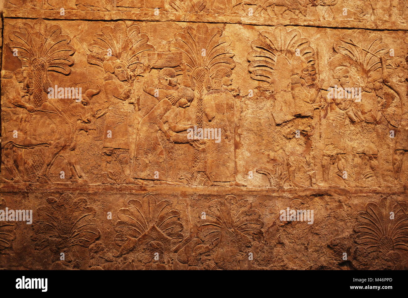 Assyrian wall art relief at the British Museum, London, England, UK ...
