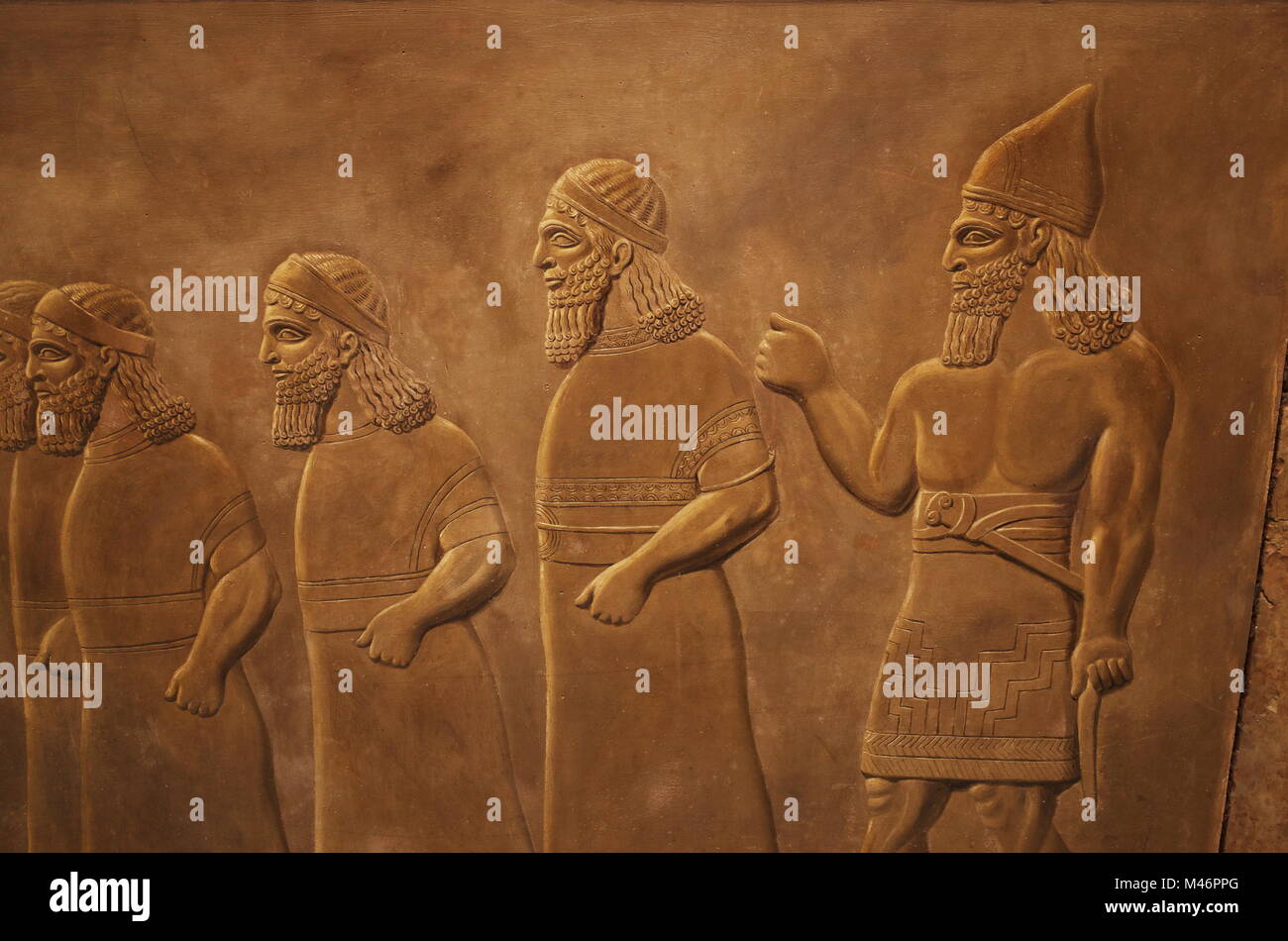 Assyrian wall art relief at the British Museum, London, England, UK ...