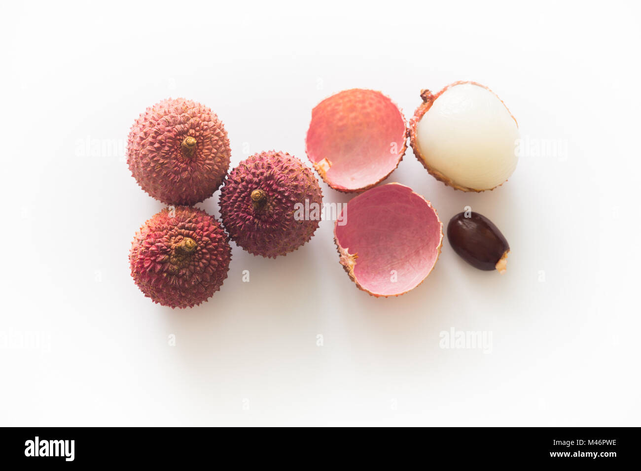 Lychee on the bright background Stock Photo - Alamy
