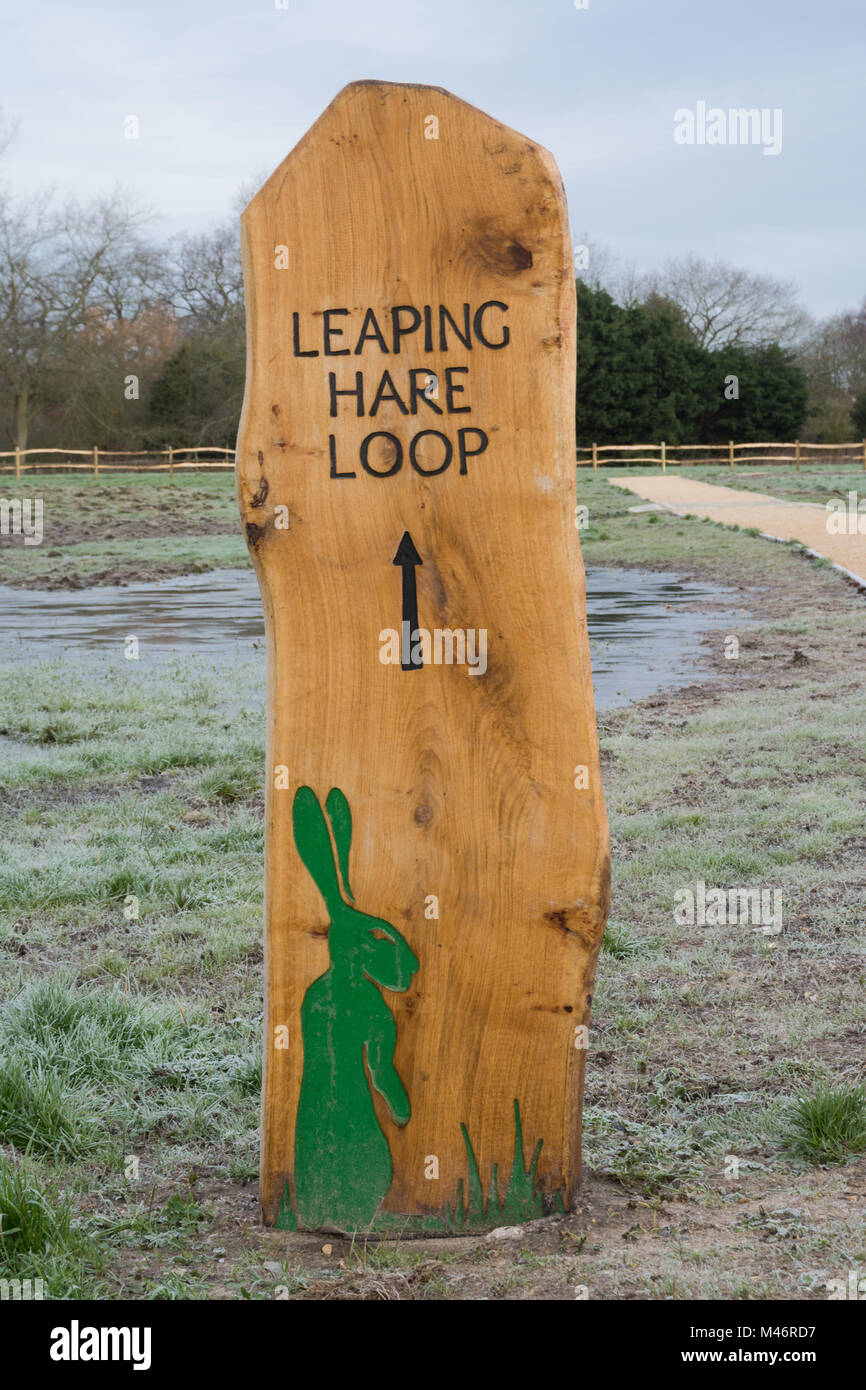 Wooden signpost for a walking trail around Bramshot Farm Country Park ...