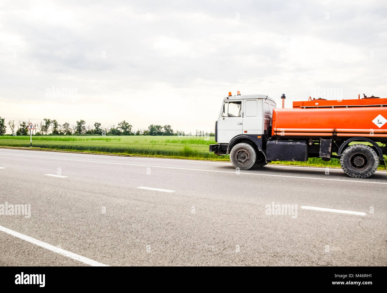 Transportation of flammable liquids. Freight vehicles on the track ...