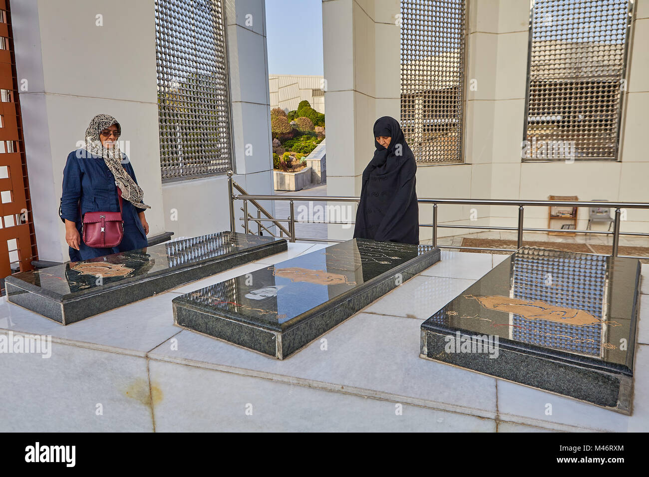 Tehran, Iran - April 28, 2017: Iranian woman in hijab stands before War ...