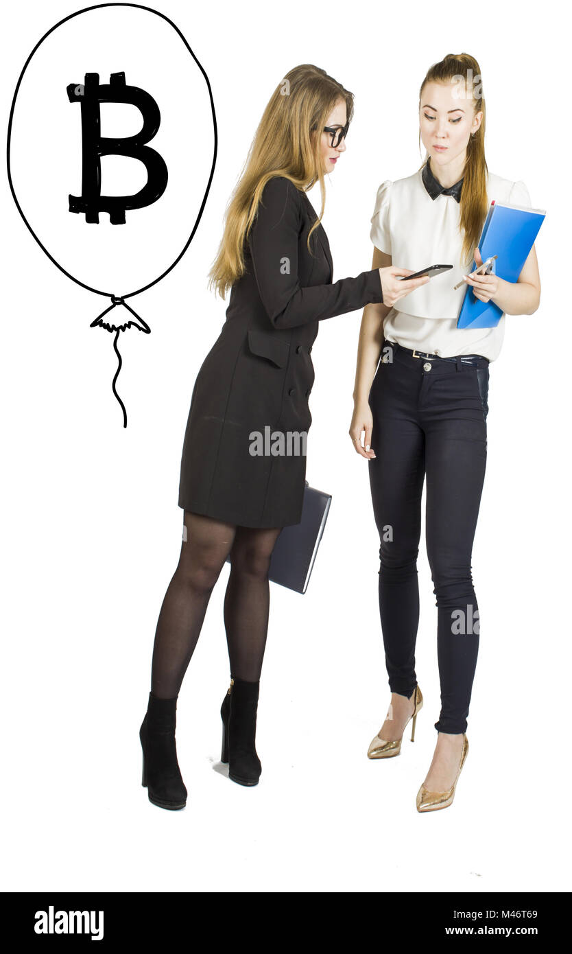 Beautiful women standing over white background with bitcoin sketches ...