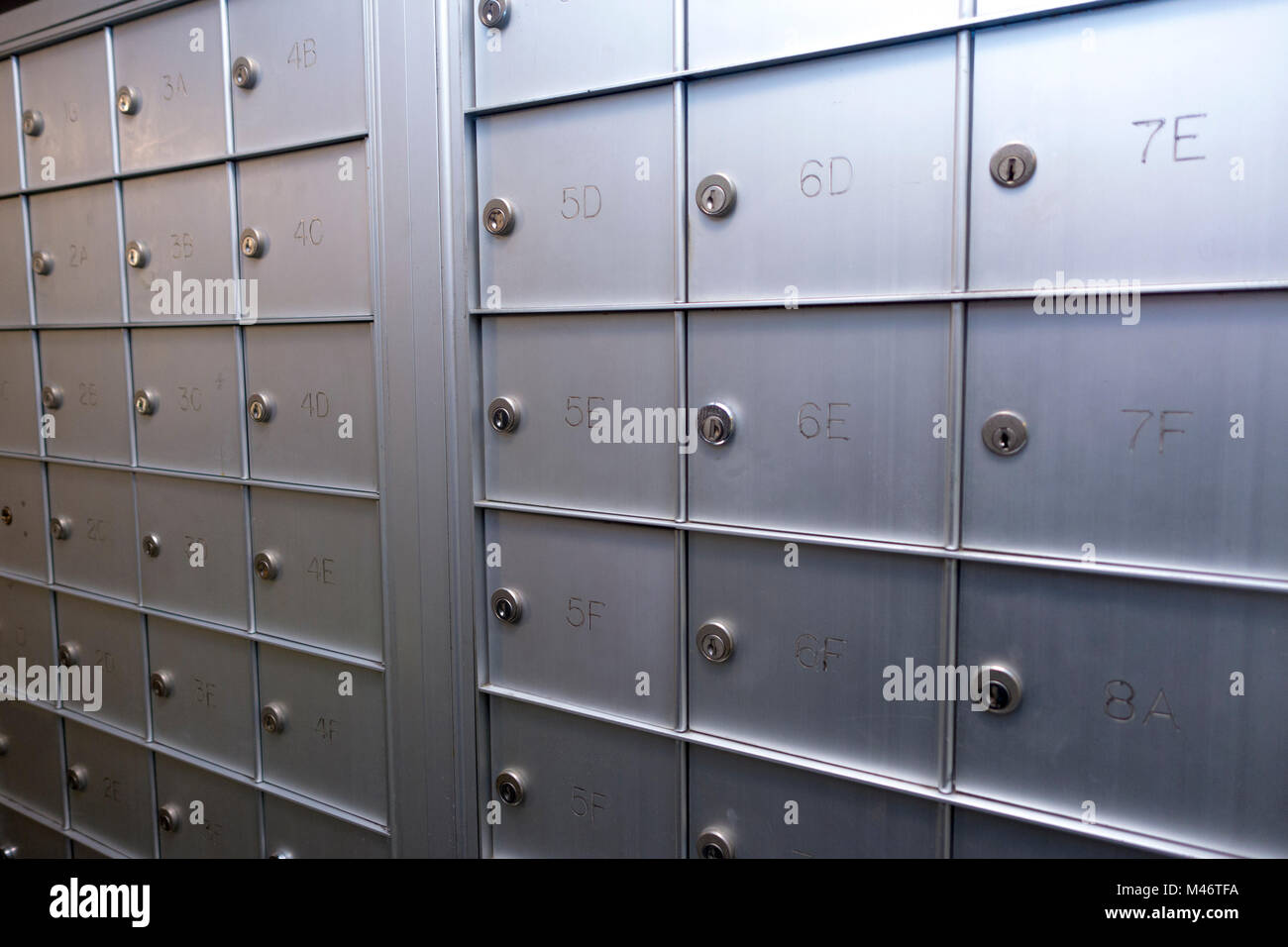 aluminum mail box area of a building Stock Photo - Alamy