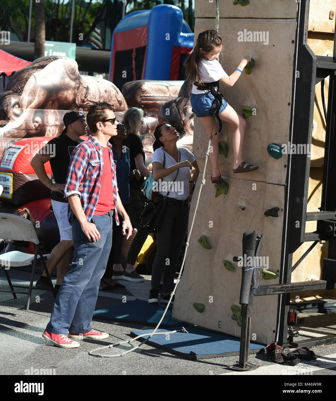 Johnny Knoxville watches as daughter Arlo Clapp takes on the climbing ...
