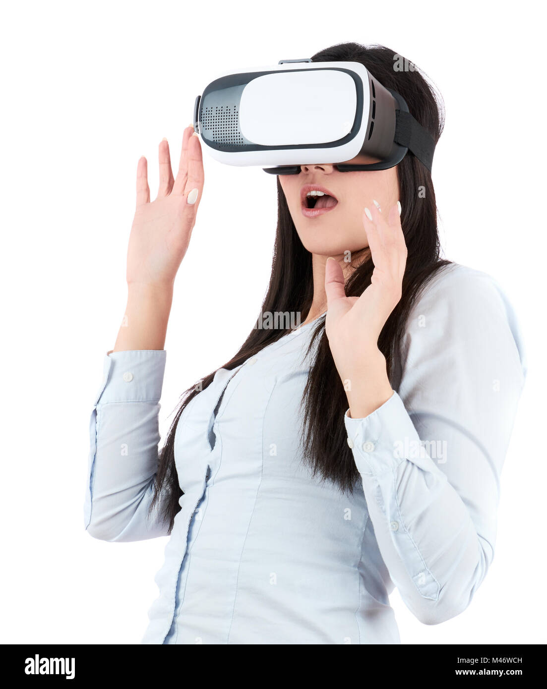 Young woman is using VR headset isolated on white background Stock ...