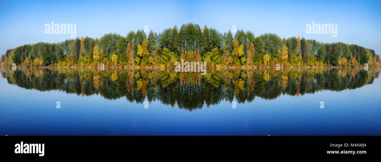 picturesque reflection of trees in a river Stock Photo - Alamy