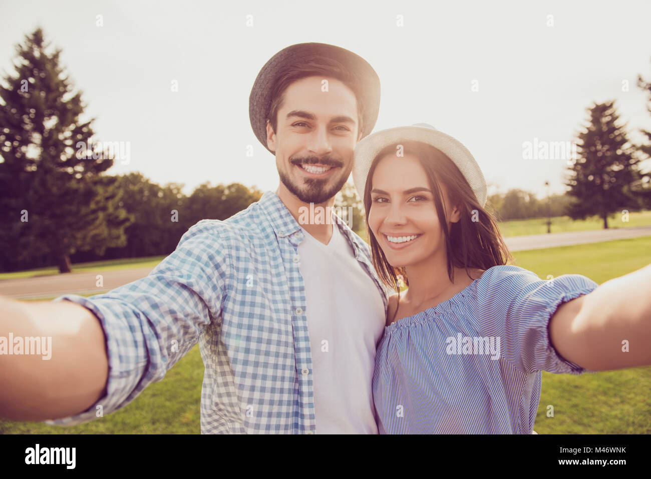 Cute gorgeous sweet partners with beaming grins taking photo shot on ...