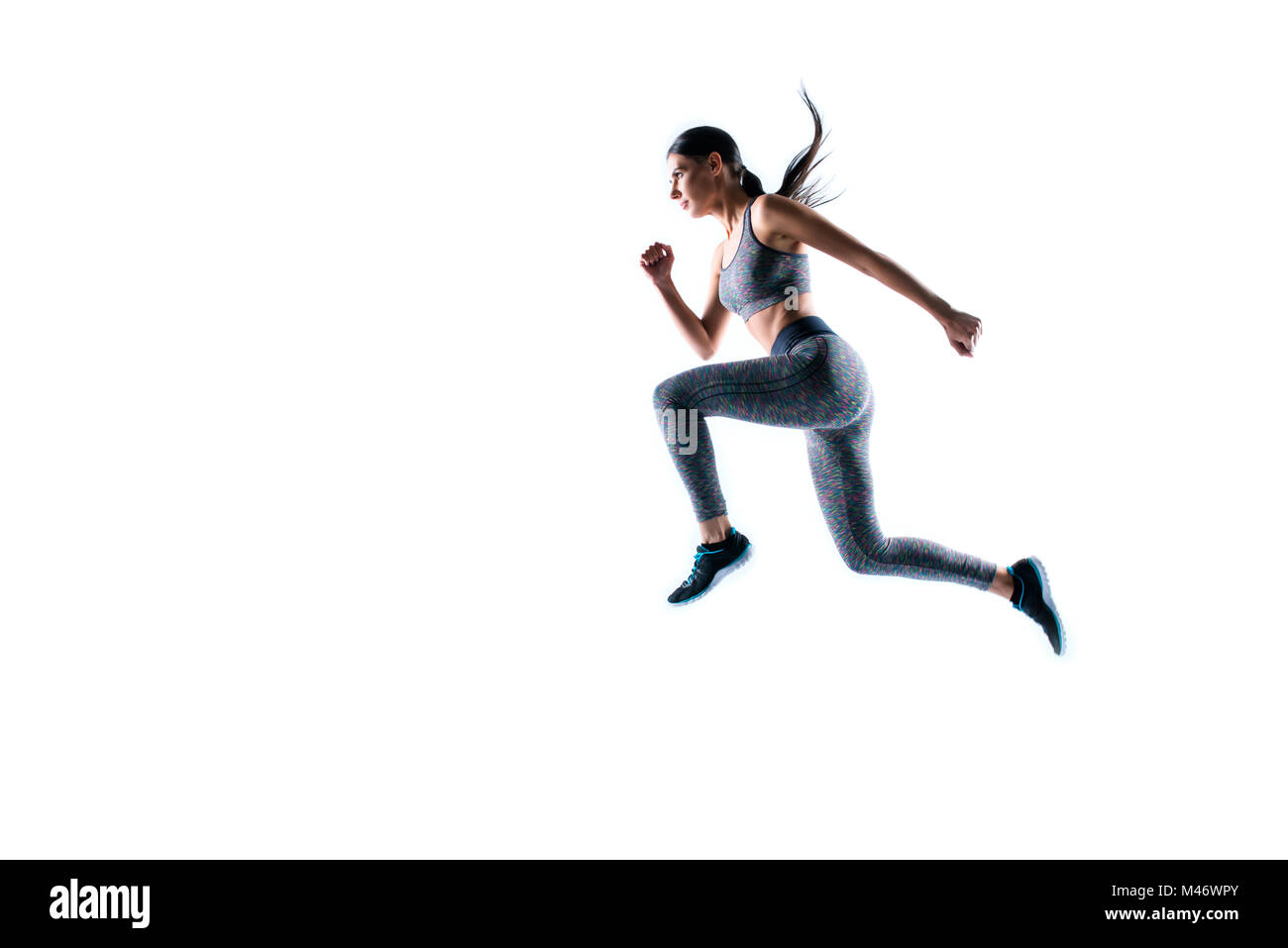 Dynamic movement. Full size side profile view portrait of strong sporty ...