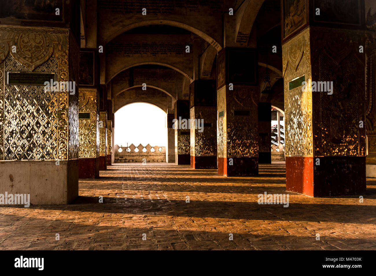 Mandalay Hill temple hallway at sunrise Stock Photo - Alamy
