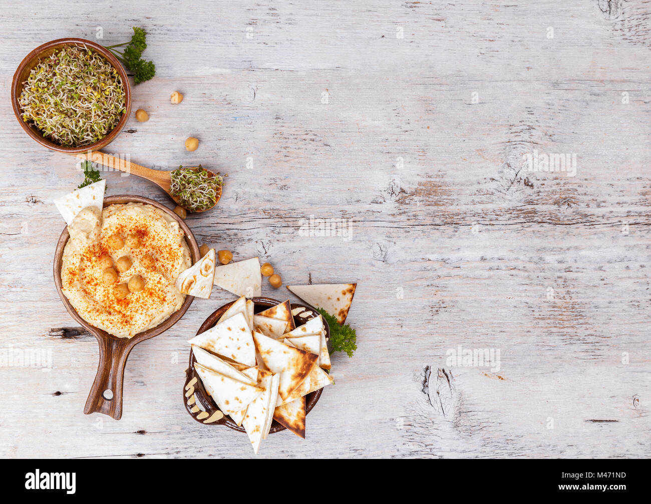 Top view of bowl of homemade hummus, space for your text Stock Photo ...