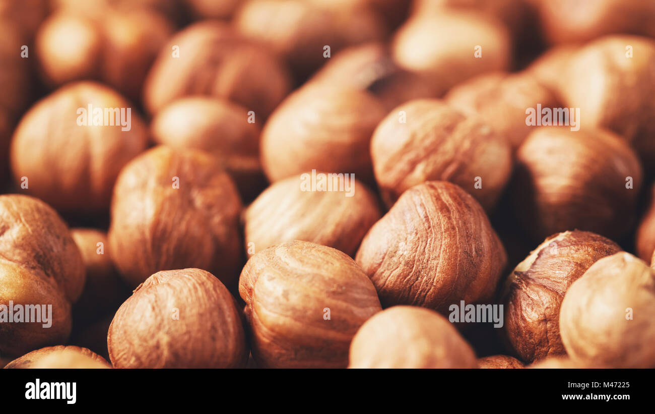 peeled hazelnuts close up background Stock Photo - Alamy