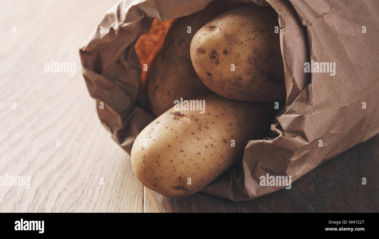Potatoes in brown paper bag hi-res stock photography and images - Alamy