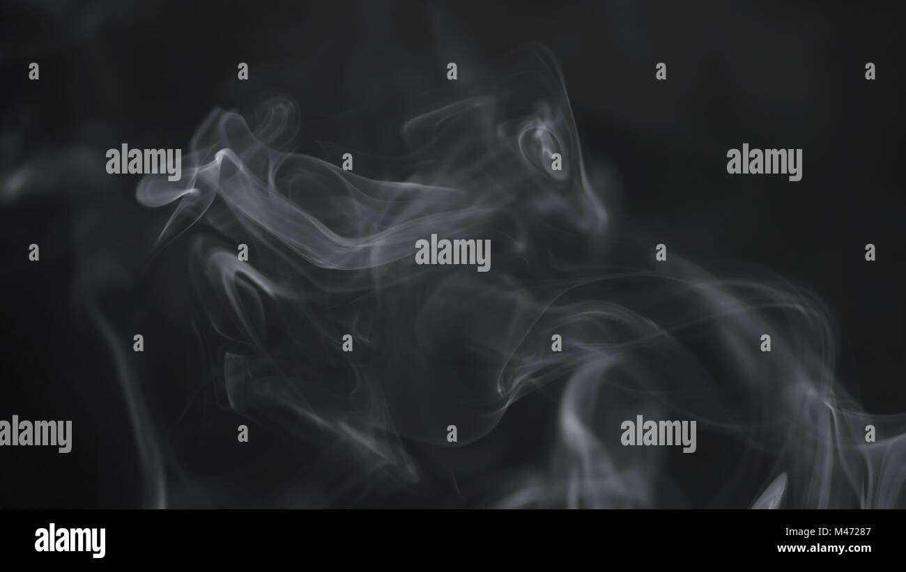 real blue smoke background in dark environment Stock Photo - Alamy