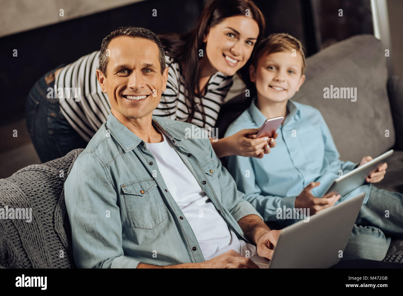 Family gadgets hi-res stock photography and images - Alamy