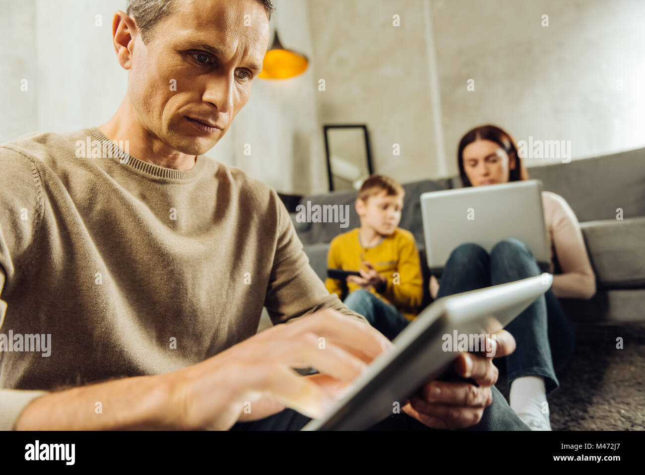 Child using tablet parental hi-res stock photography and images - Alamy
