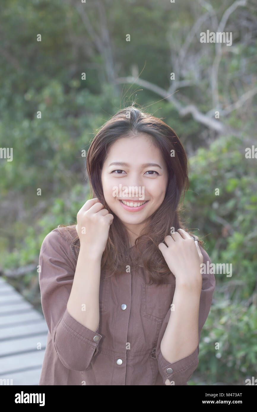 portrait of asian younger woman toothy smiling face Stock Photo - Alamy