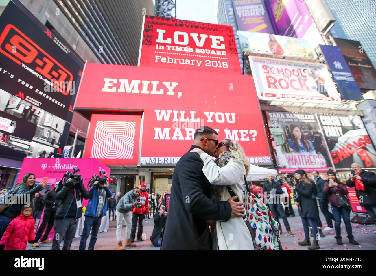 New York, USA. 14th Feb, 2018. Joseph Lodato (L) kisses Emily ...
