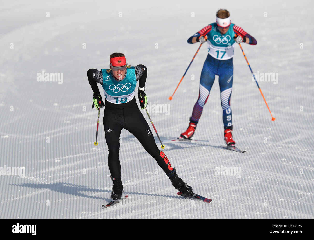 Victoria Carl (L) from Germany approaching the finish line followed by ...