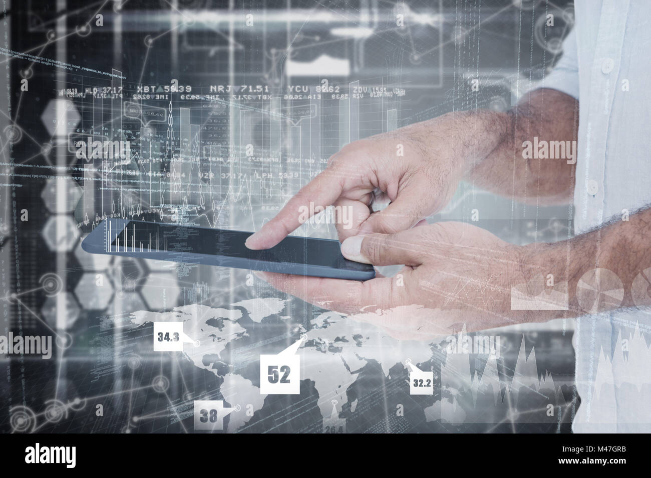 Composite image of a man using tablet computer Stock Photo - Alamy