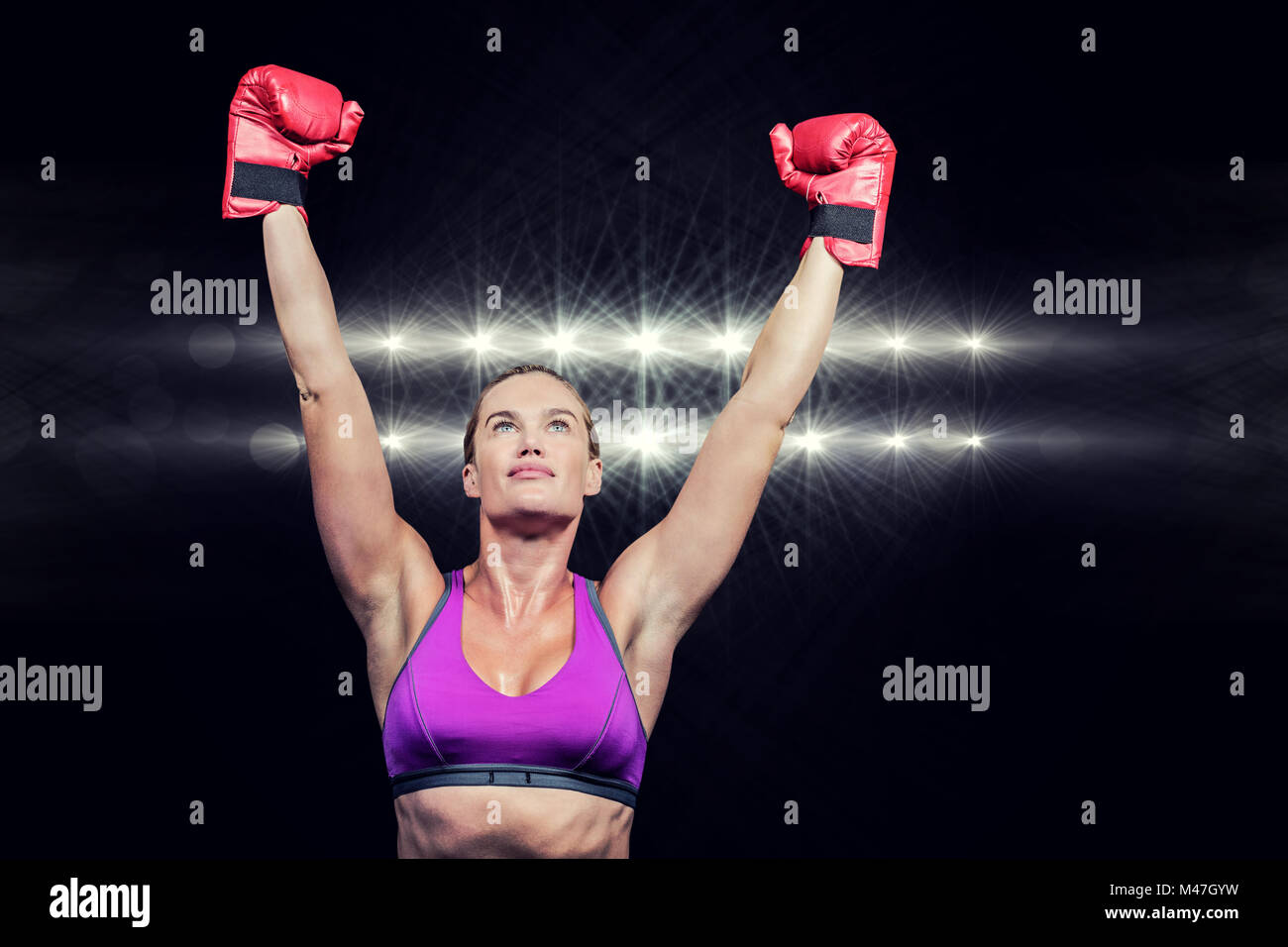 Female bodybuilder with arms raised hi-res stock photography and images ...