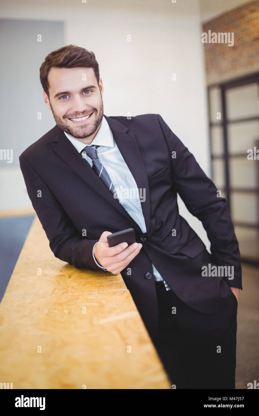 Leaning on counter hi-res stock photography and images - Alamy