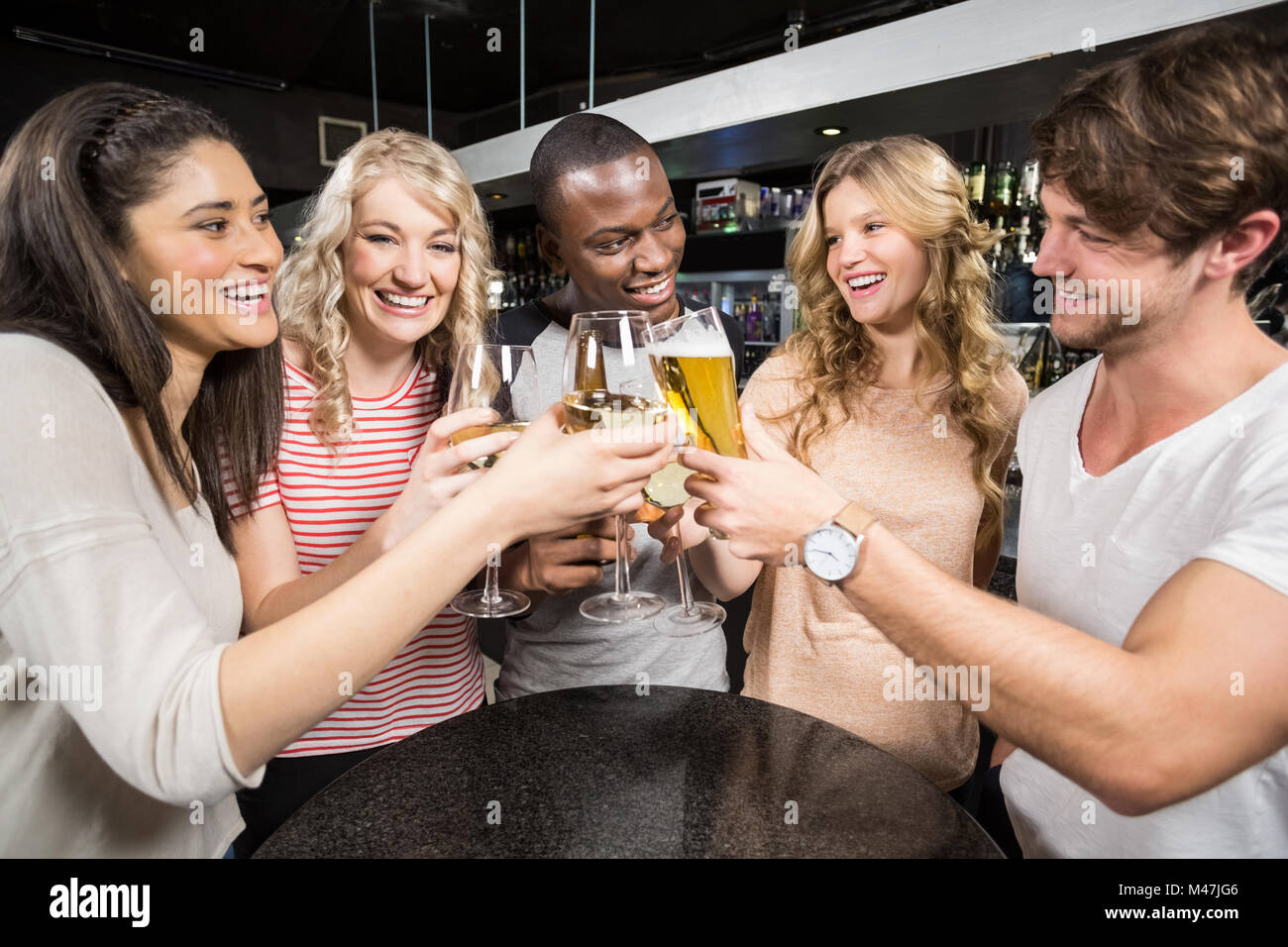 Friends toasting wine beer hi-res stock photography and images - Alamy