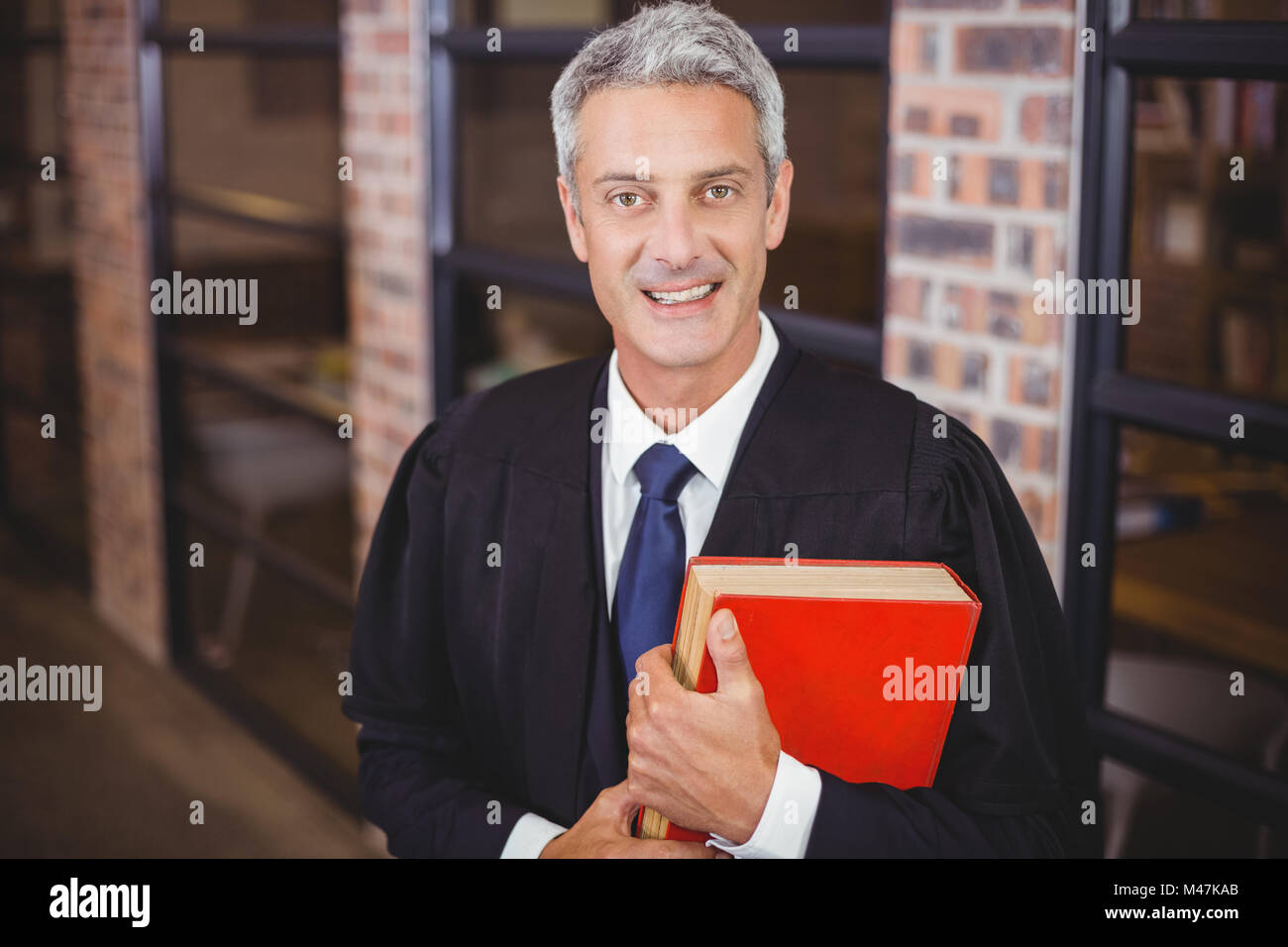 Authority standing looking at camera close up hi-res stock photography ...